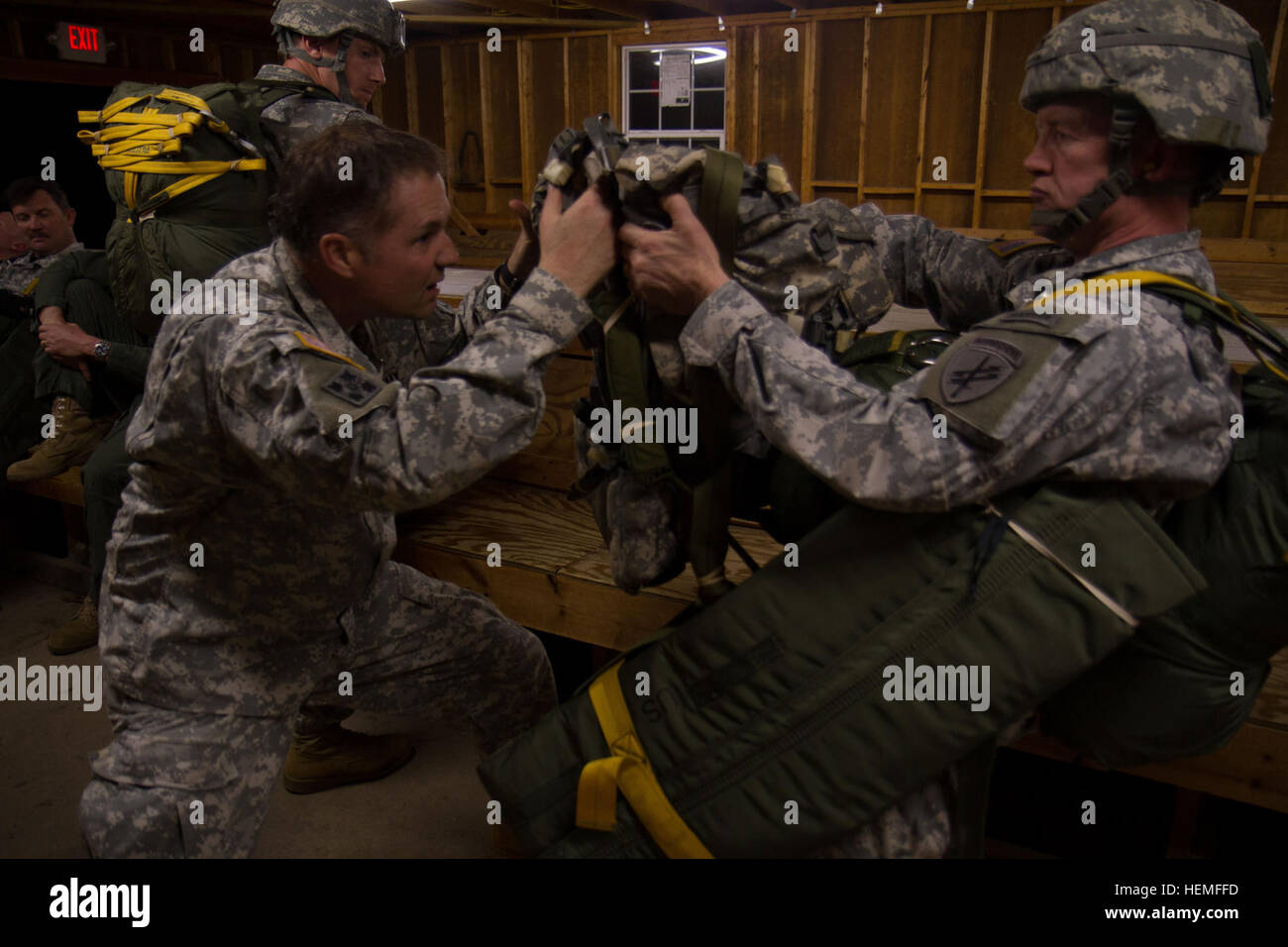 Lt. Col. Russ Staley, left, checks Col. Roger Cotton's rucksack in a ...