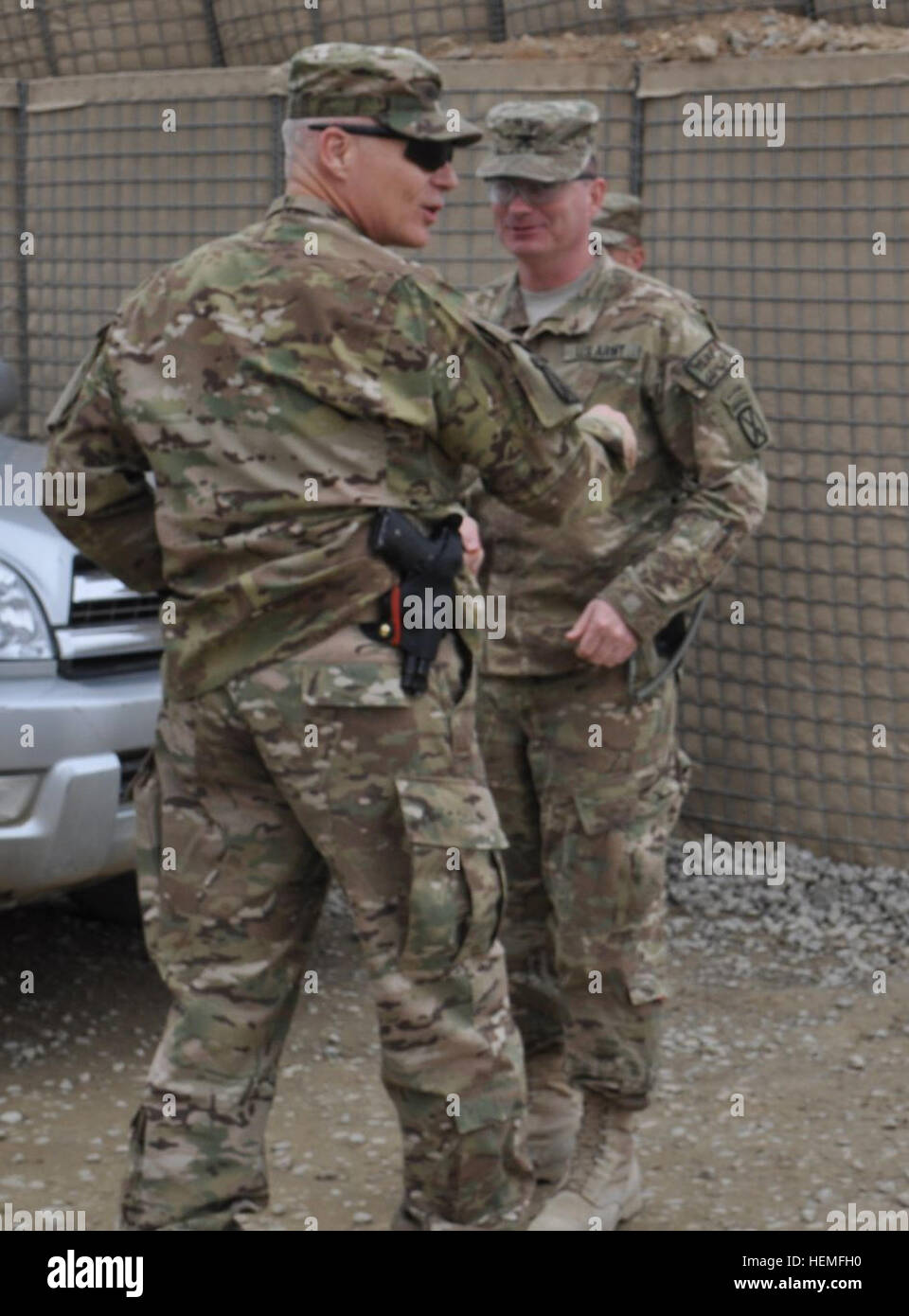 U.S. Army Lt. Gen. James Terry, back to camera, the commander of ...