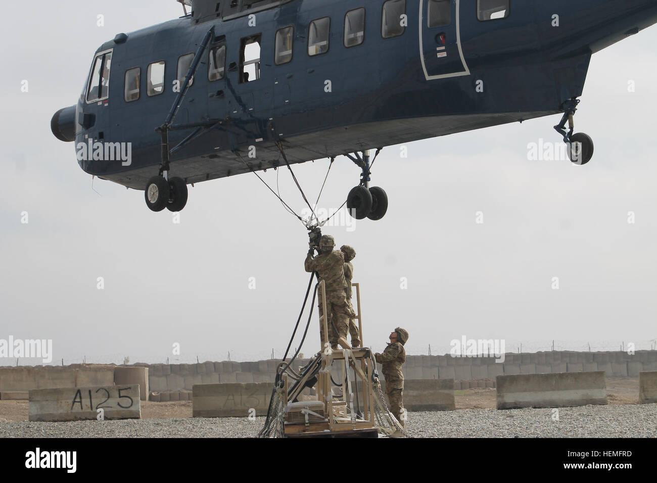 U.S. Army Spc. Rey Reyes and Spc. Eddie Ortiz, both unit supply ...