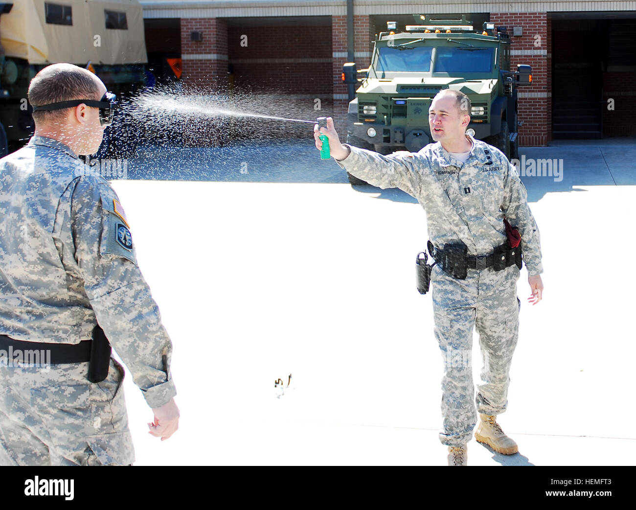 U.S. Army Capt. Kyle Thomason, right, a training officer with the ...