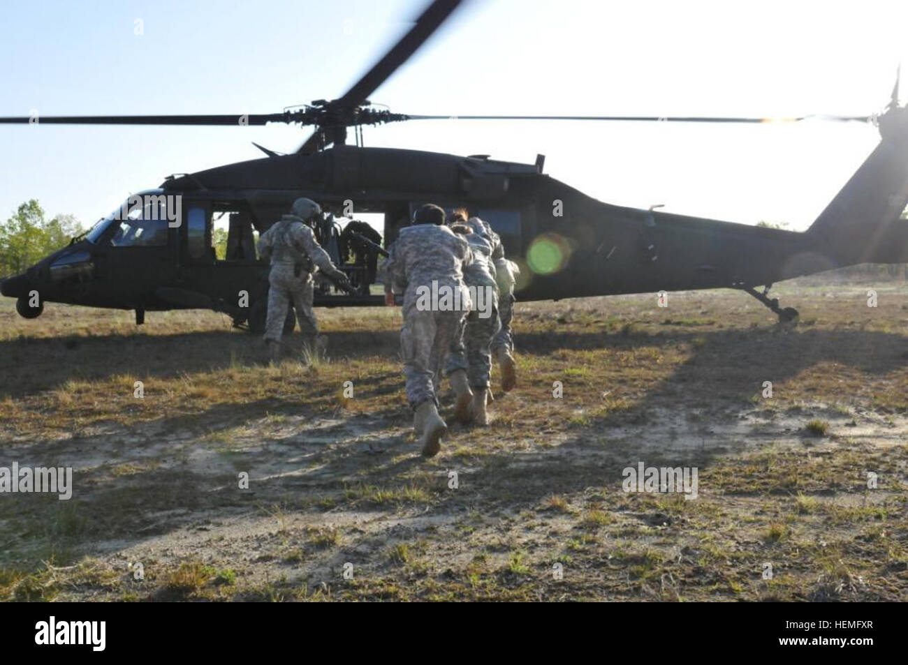 U.S. soldiers board a UH-60 Black Hawk helicopter while participating ...
