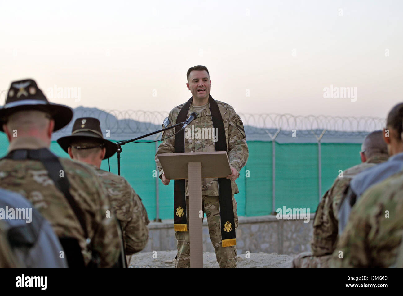 U.S. Army Maj. Steve Prost, center, offers an invocation during an ...