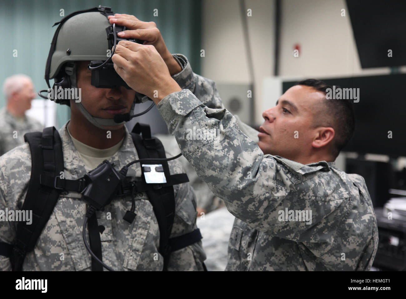 U.S. Army CW2 Eduardo Martin (Right) assigned to Headquarters Troop is ...