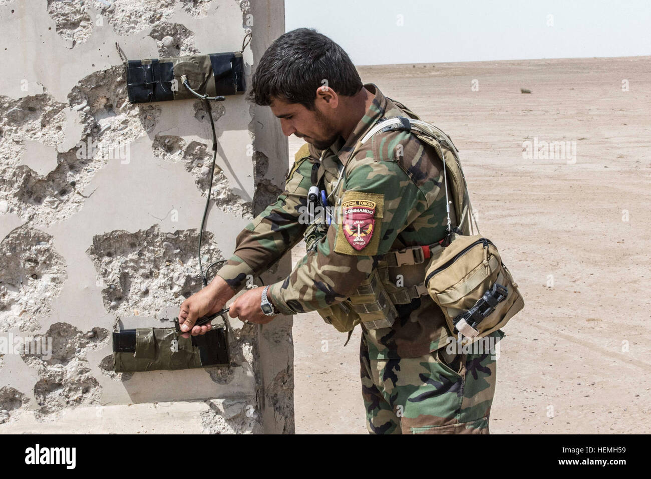 An Afghan National Army Special Forces (ANASF) member mounts breaching ...