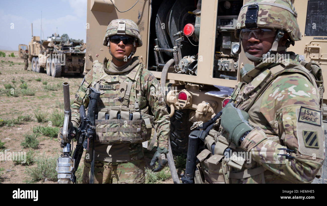 Army Spc. Israel Ninaarnez (left) and Army Sgt. Michael Butler ...