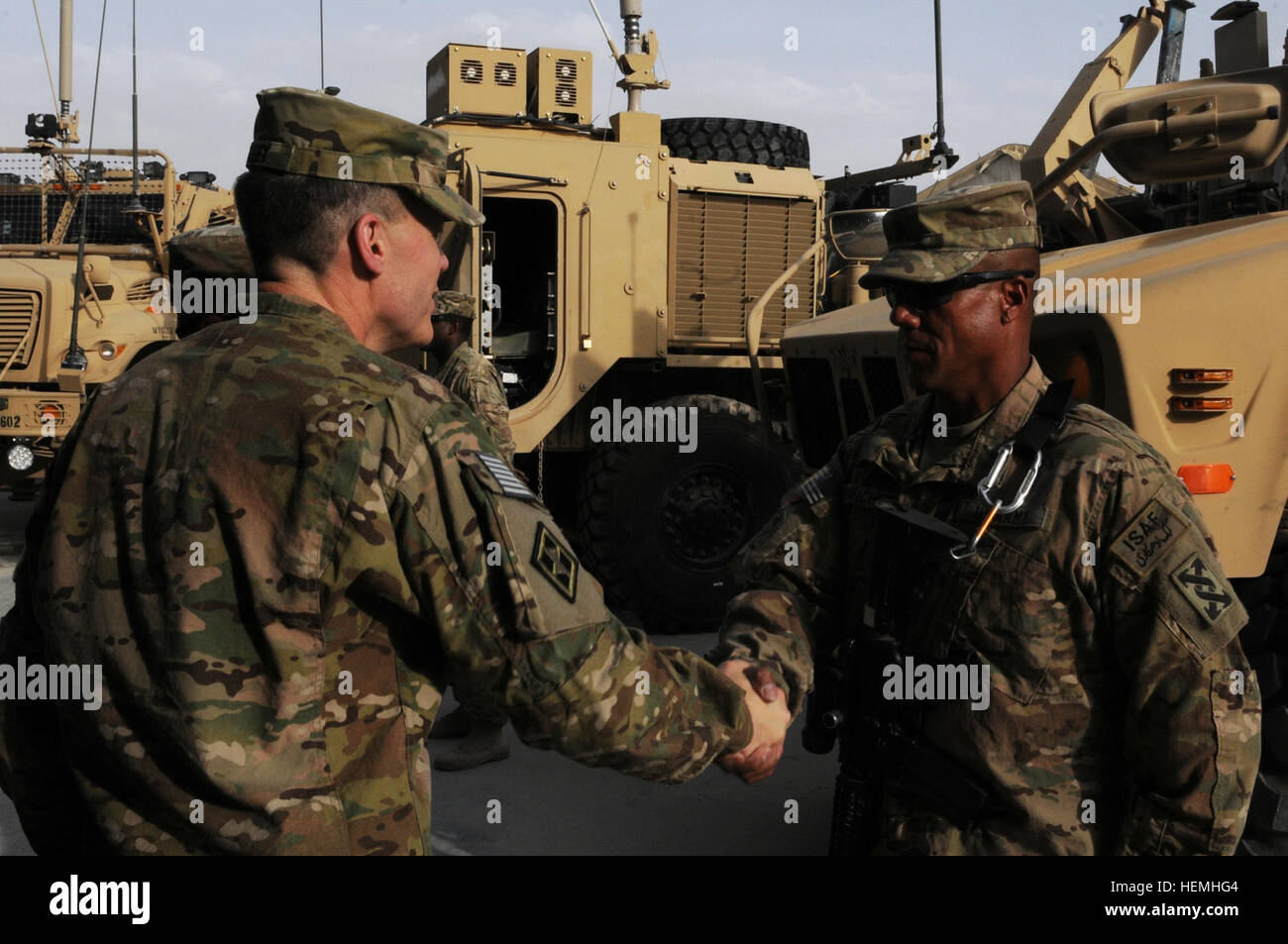 Sgt. Raul Sanchez briefs Lt. Gen. Jeffrey Talley, commanding general, U ...