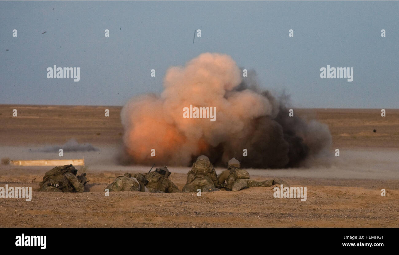 Coalition security force members take cover during demolition training ...
