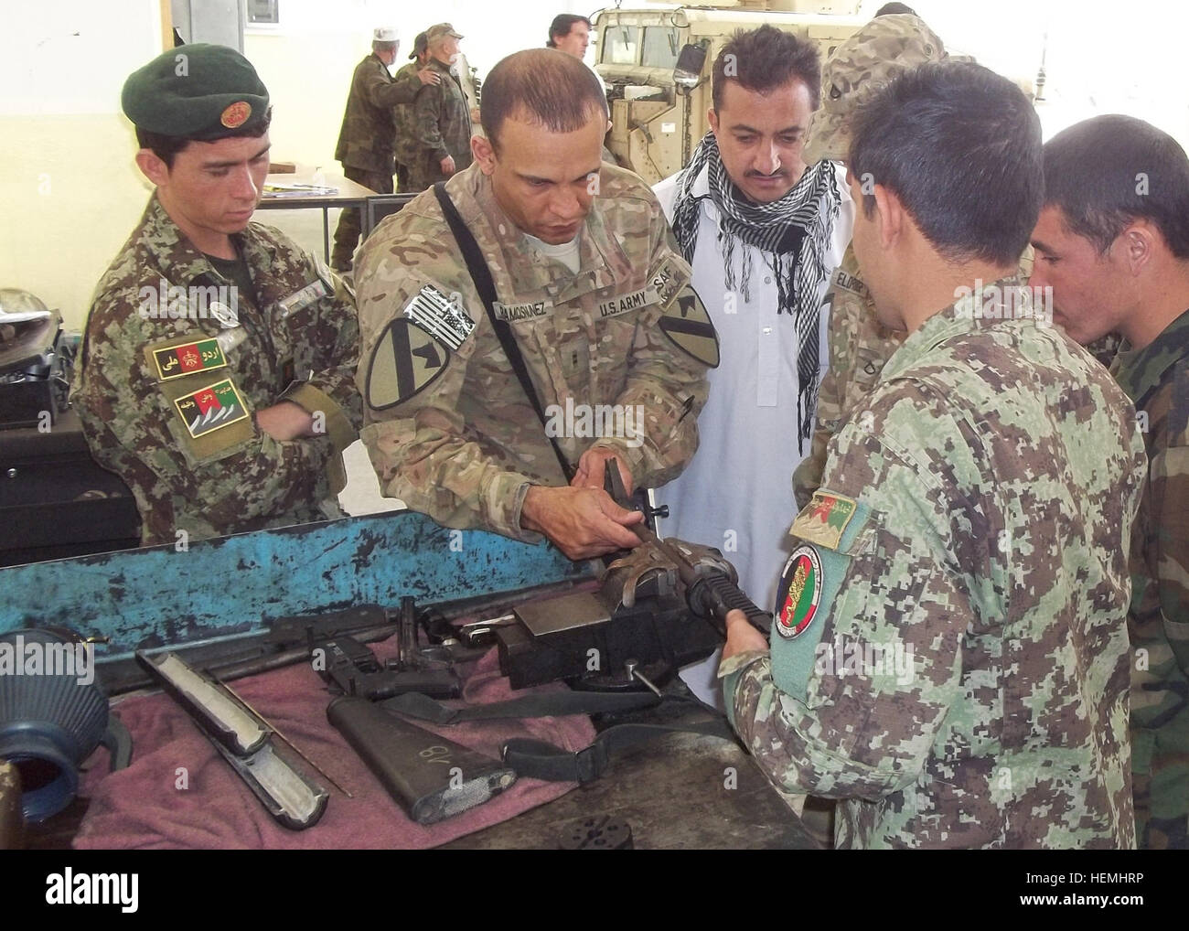 An Afghan National Army soldier and U.S. Army Chief Warrant Officer 2 ...