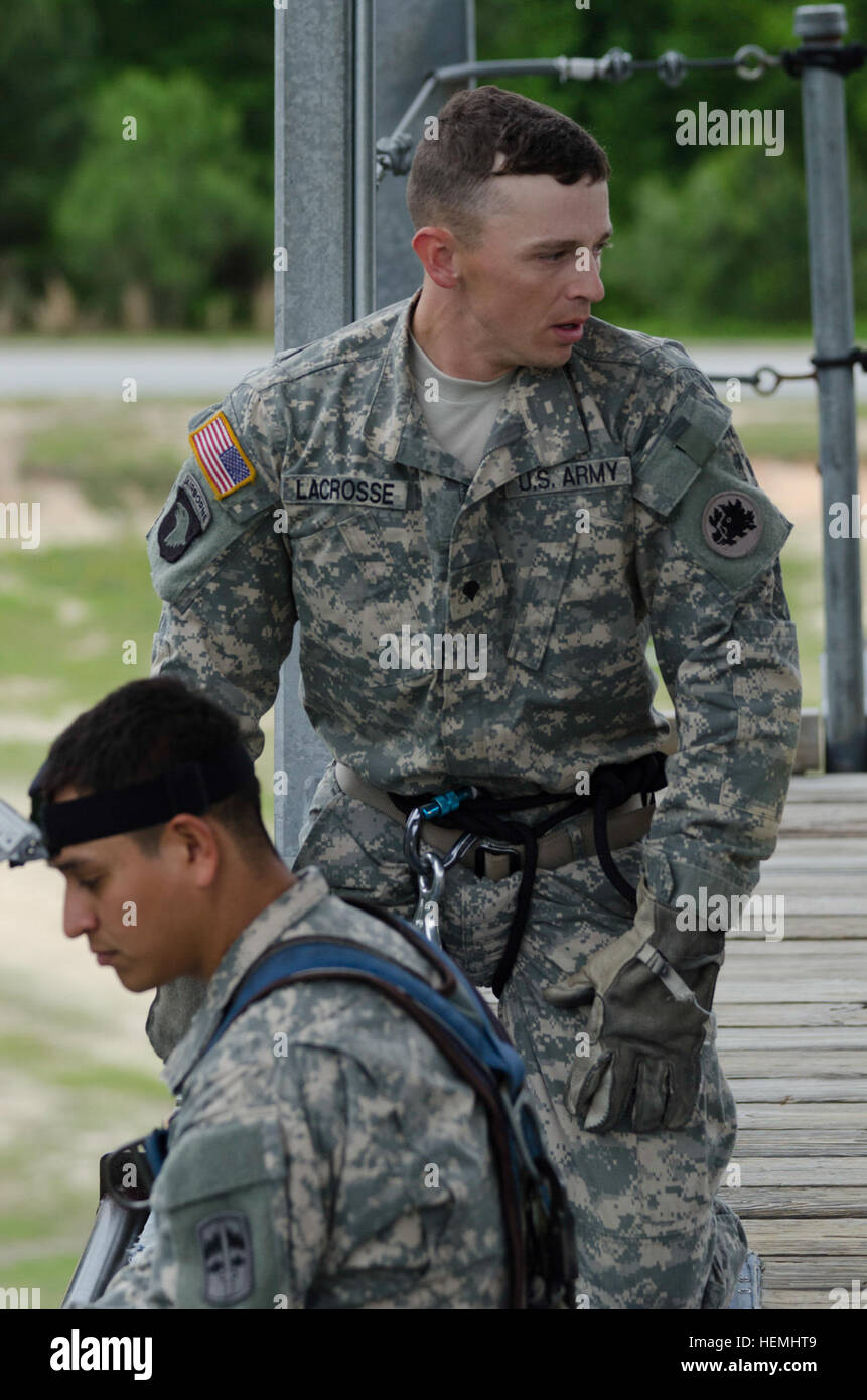Georgia Army National Guard Spc. Benjamin Lacrosse from the 278th Military Police Company, rests ...