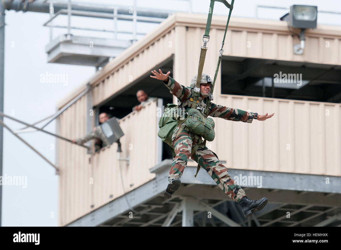An Indian Army paratrooper with the 50th Independent Para Brigade exits ...