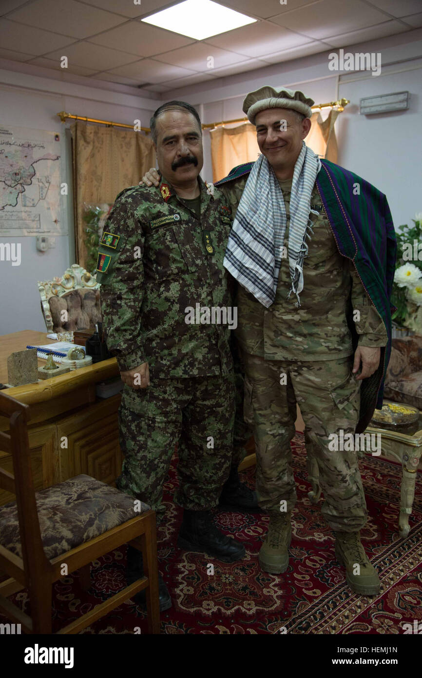 Afghan National Army (ANA) Maj. Gen. Mohammad Zaman Wazeri, left, the ...