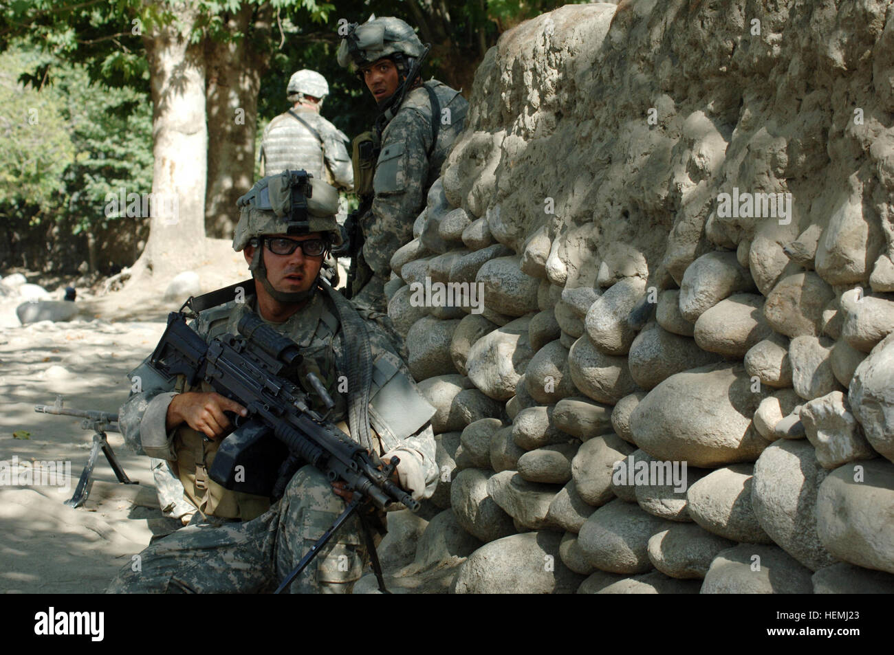 Soldiers from Alpha Company, 2-82 Aviation Battalion, pull security as ...