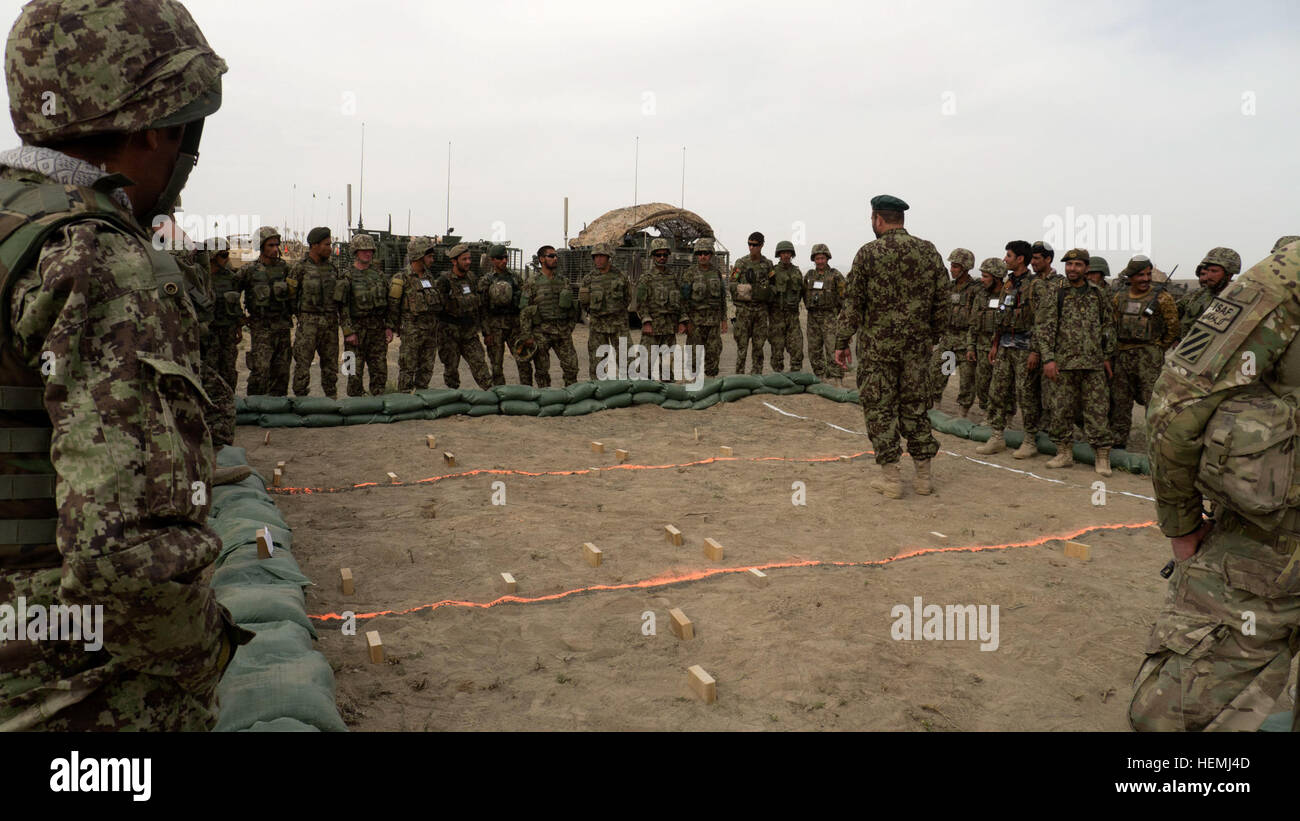 Soldiers of the 2nd Mobile Strike Force, Afghan National Army, huddle ...