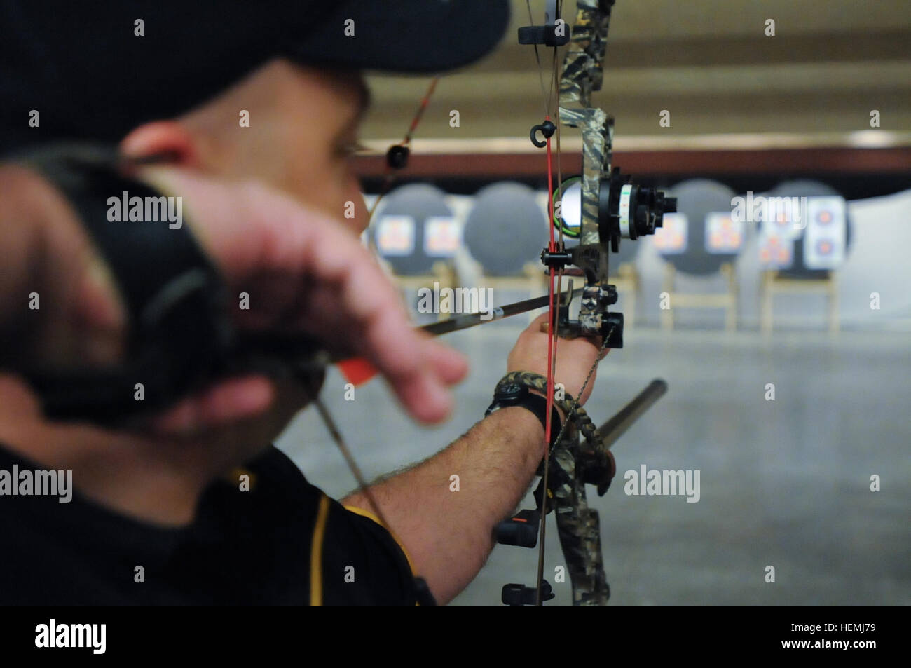 U.S. Army Capt. Frank Barroquiero, practices archery at the 10th ...