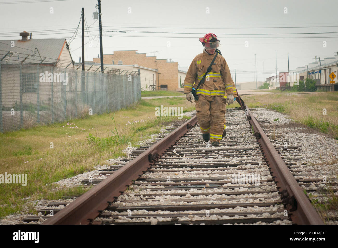 Fort Hood firefighters Andy Hunter and Ryan Pawley scan the area around ...