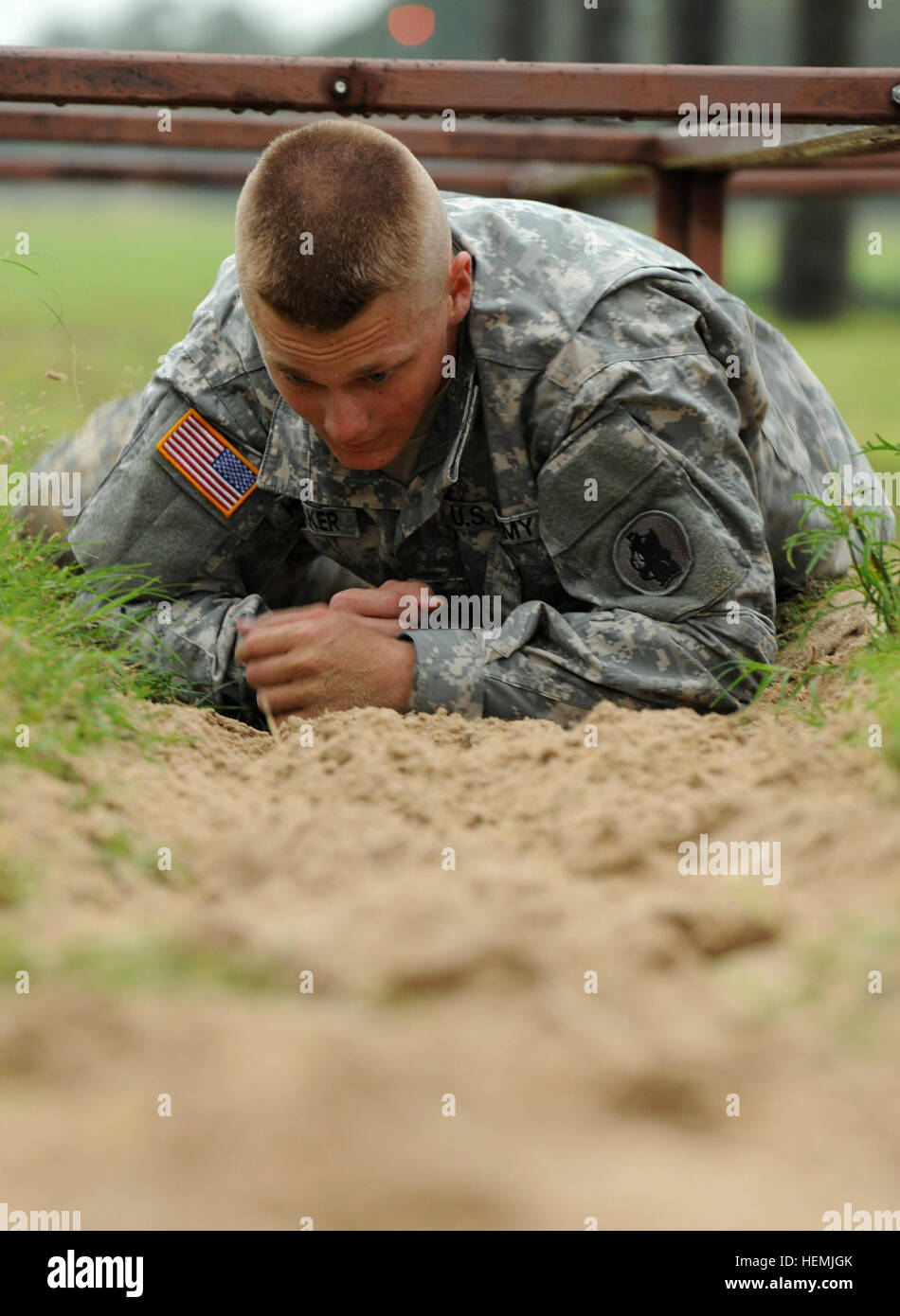 U.S. Army Military Police soldiers navigate the Low Crawl Pit during ...