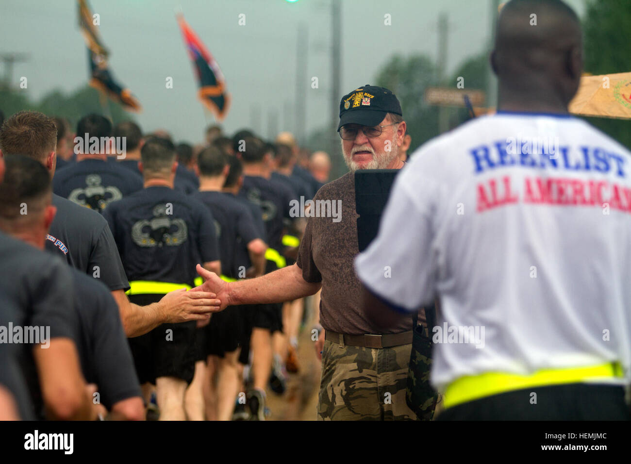 A former paratrooper of the 82nd Airborne Division congratulates U.S ...