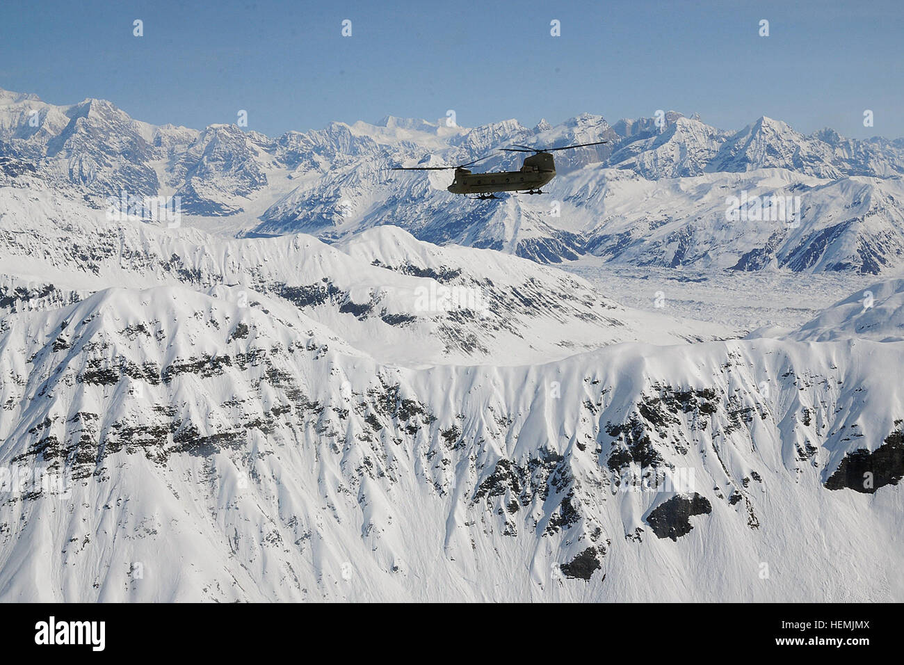 A U.S. Army Alaska Aviation Task Force CH-47 Chinook helicopter flies ...