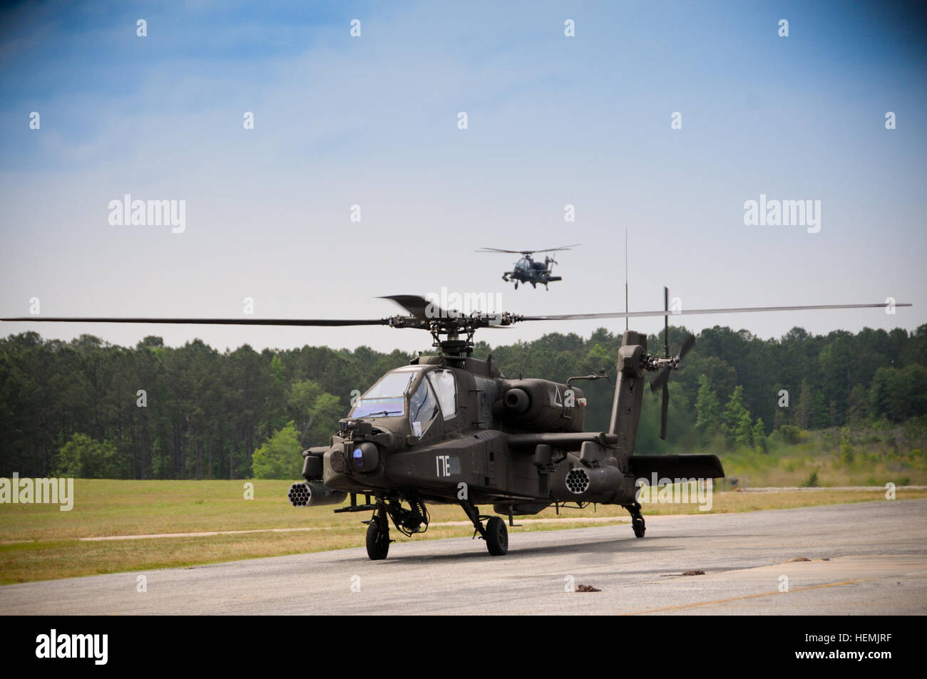 A U.S. Army AH-64D Apache helicopter taxis into the parking area at Ech ...