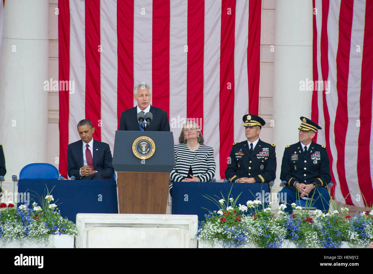 Secretary of Defense Chuck Hagel, at lectern, speaks during a Memorial ...