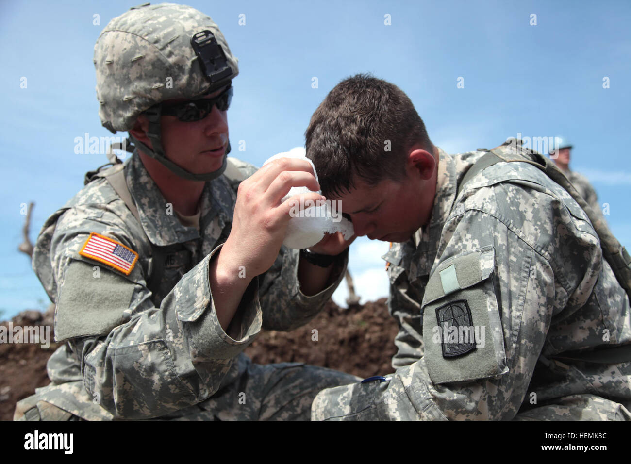 U.S. Army Pfc. Mark Nicks, right, with the 829th Engineer Company ...