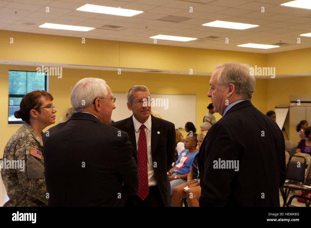 U.S. Soldiers, family and friends begin to gather just before the ...