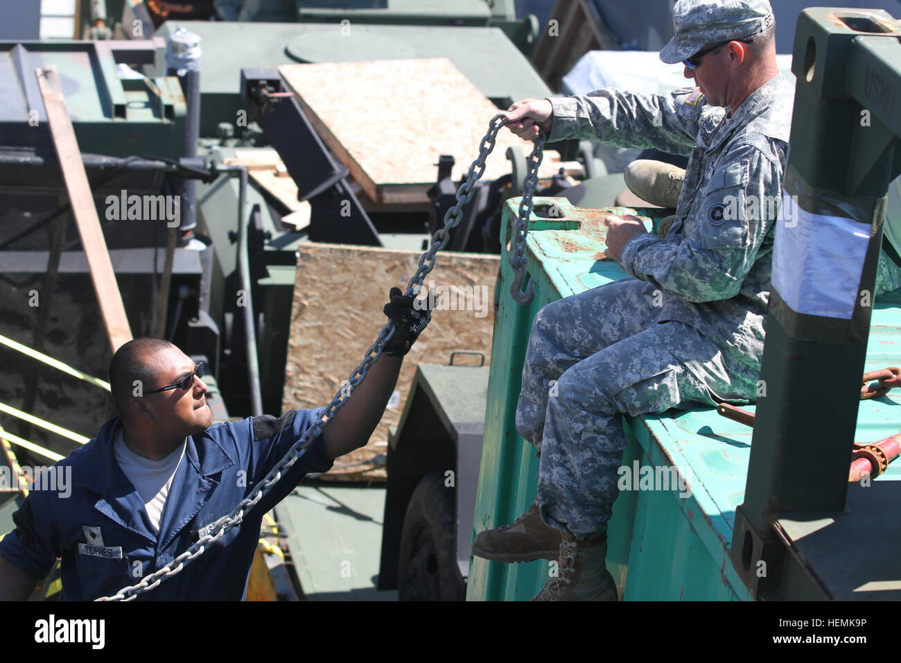 U.S. Army Warrant Officer Jacob Grobler, right, a vessel master trainee ...