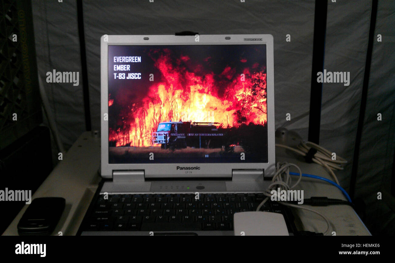 Pictured is the desktop of a deployable laptop computer from T-83 JISCC, 242nd Combat ...