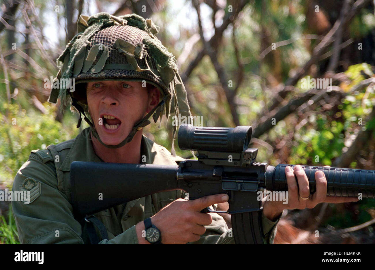 Canadian soldier Sergeant Muise, armed with a C-7 assault rifle ...