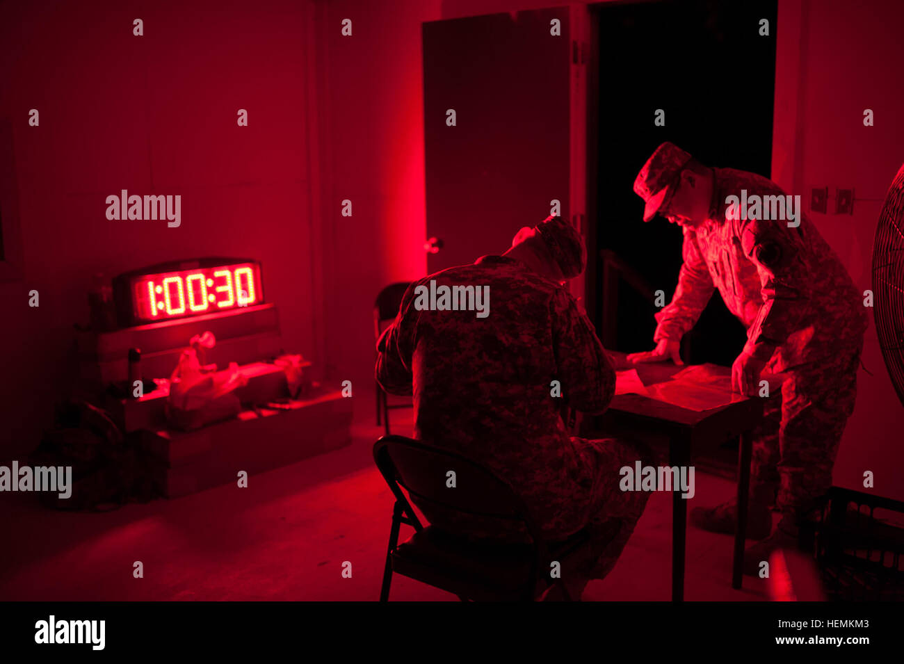 Army Reserve training cadre' check over Warrior's score sheet during ...