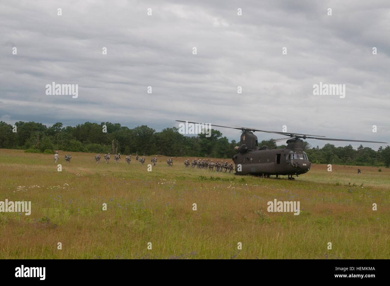 Soldiers load onto a Chinook helicopter as part of an event for the ...