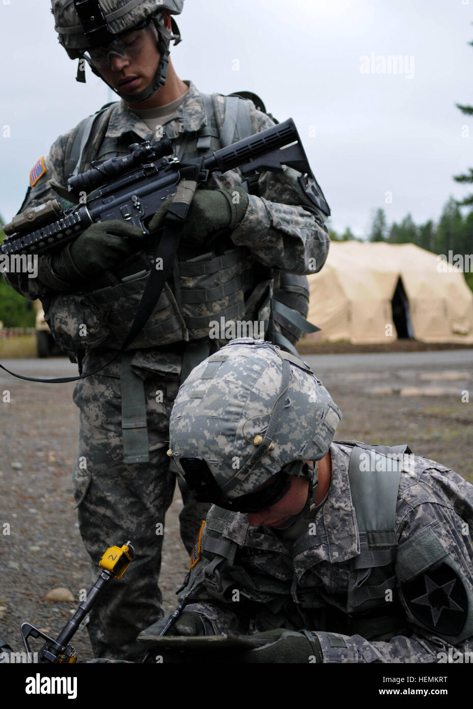 U.S. Army 1st Lt. Joseph Delong, a platoon leader, and Pfc. William ...