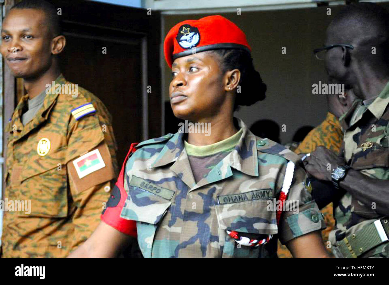 A Ghana Armed Forces military police sergeant watches over the crowd at ...