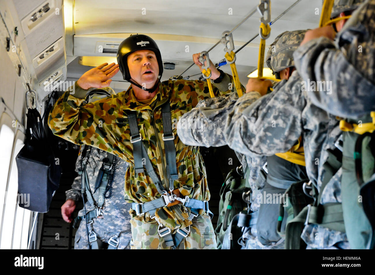 Australian Army Warrant Officer Class 2 John Edwards, left, serving as ...