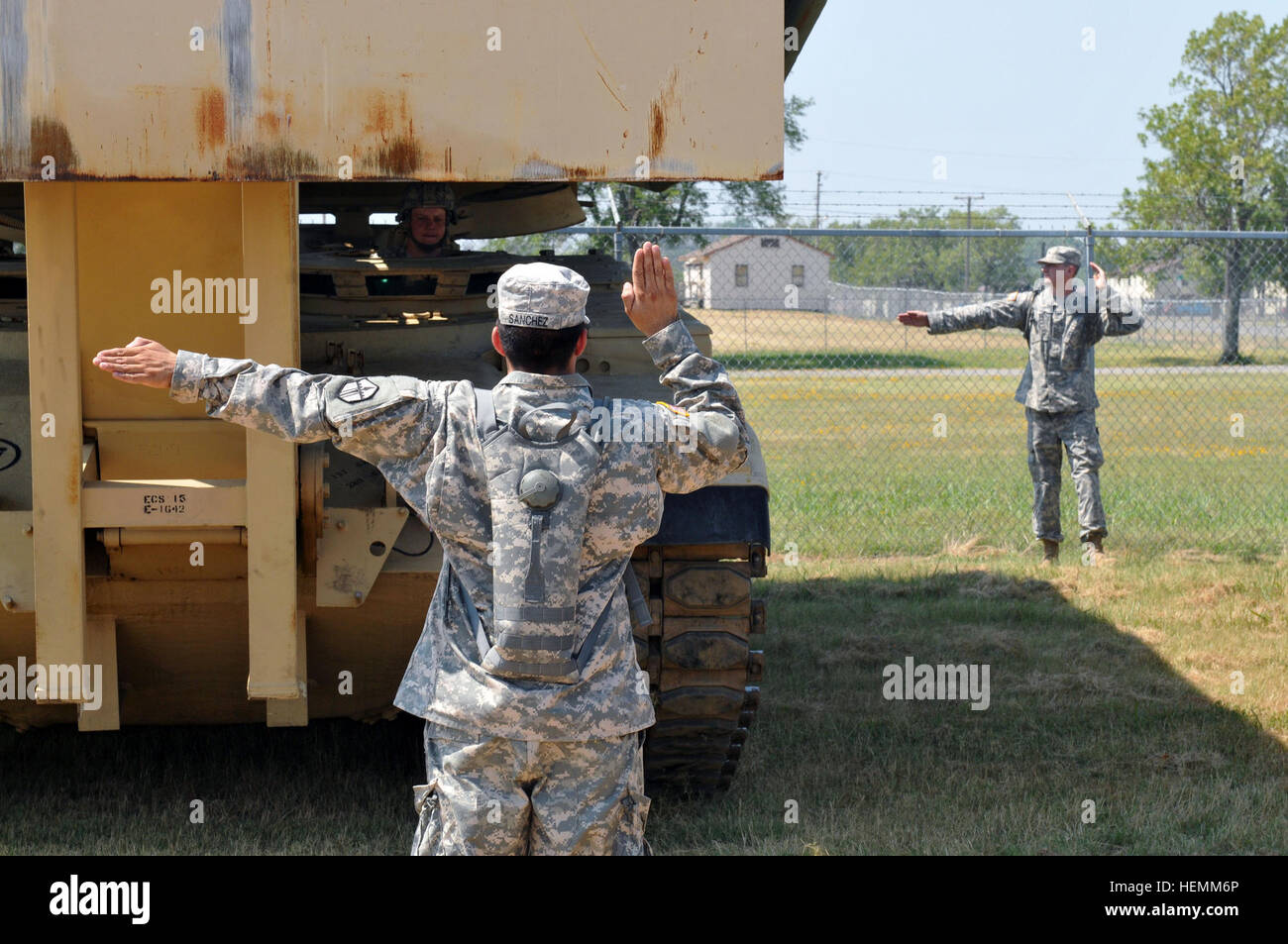Pfc. Craig Sanchez, front, and Pfc. Robert Davis, rear, ground guide an ...