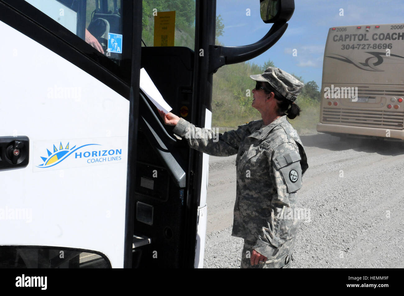 A U.S. Army exercise physiologist assisted at a health checkpoint ...
