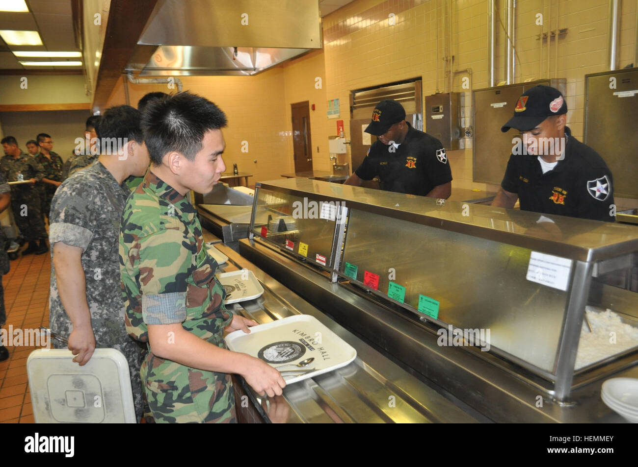 U.S. soldiers and soldiers from Third Republic of Korea Army line up ...