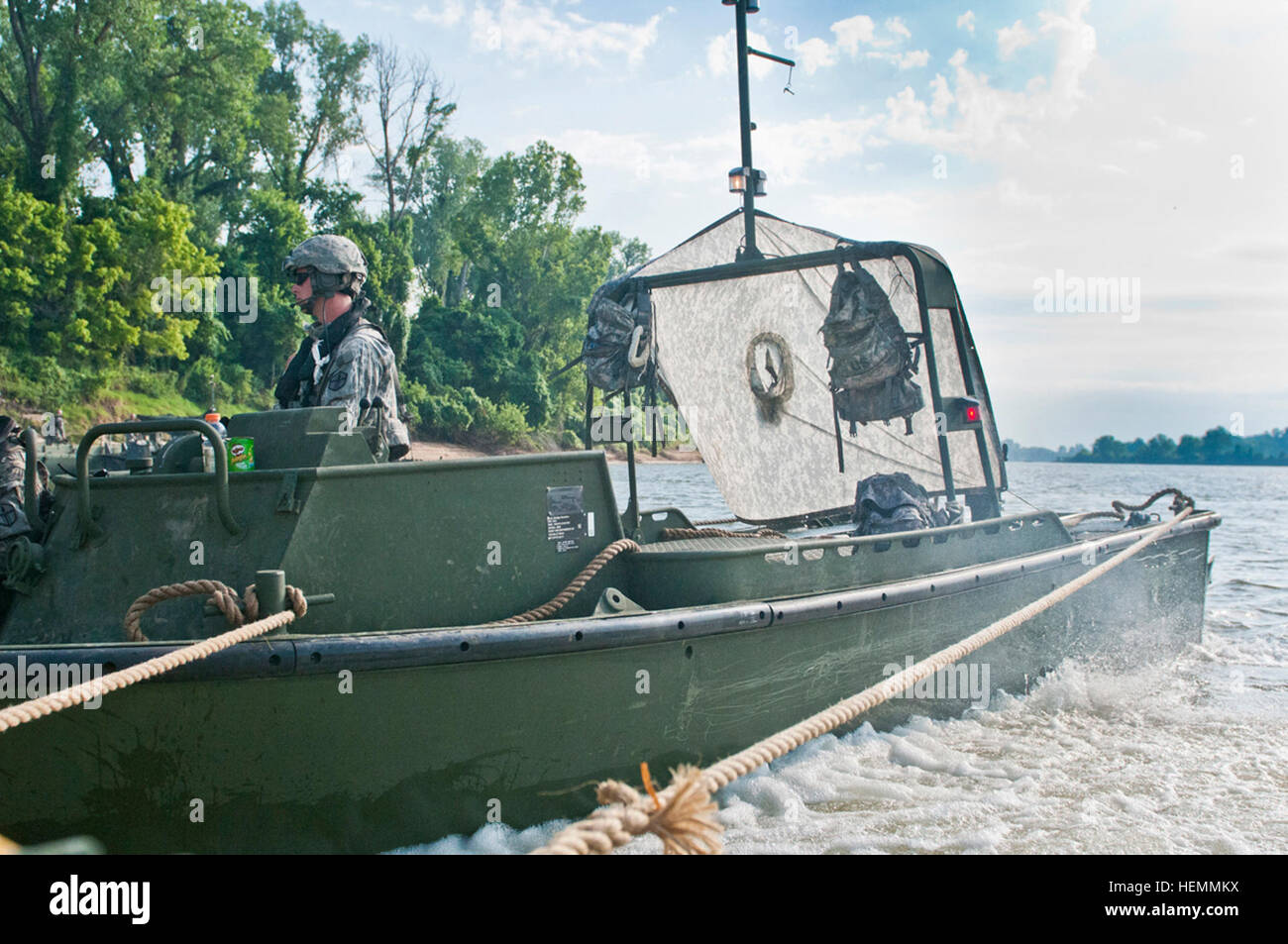 A Mark II bridge erection boat operated by a U.S. Soldier with the ...