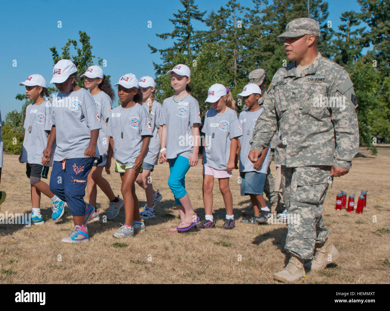 Children of 555th Engineer Brigade soldiers practice marching during ...