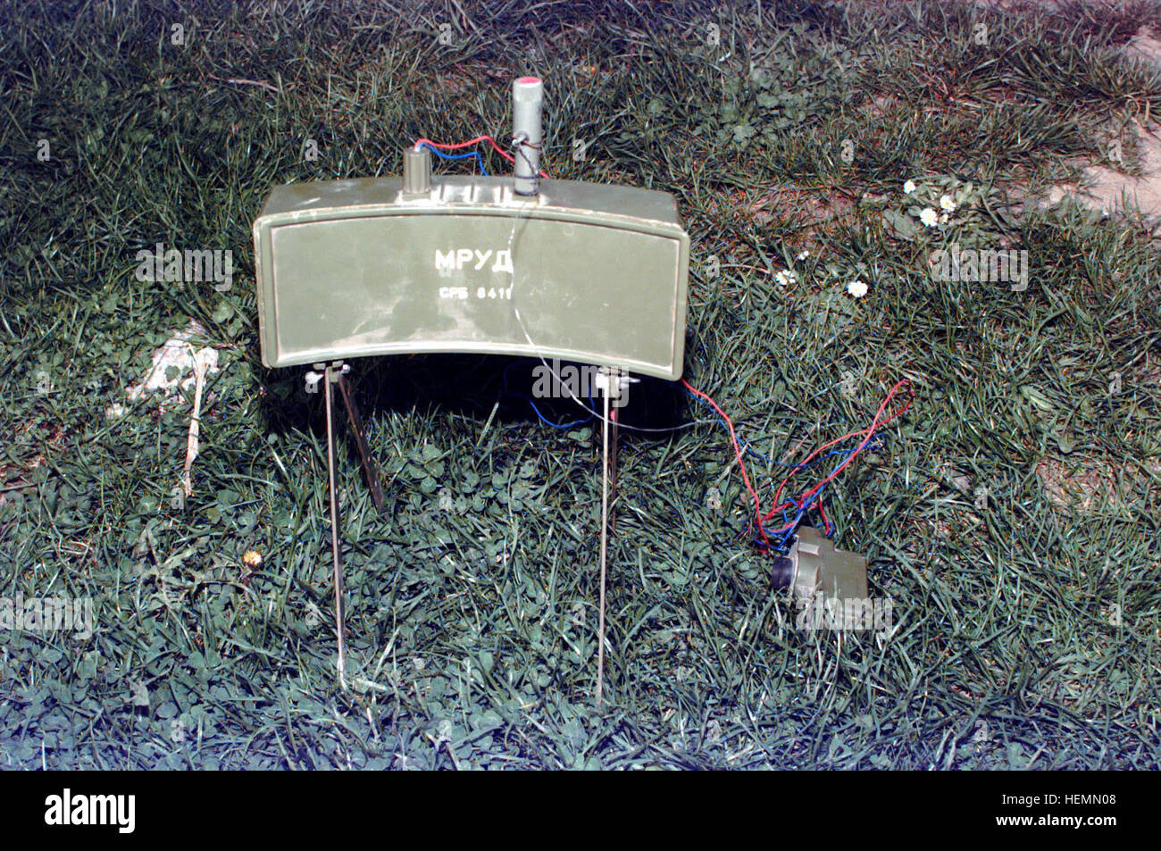 A close up view of a Former Yugoslavia MRUD anti-personnel Mine (back ...