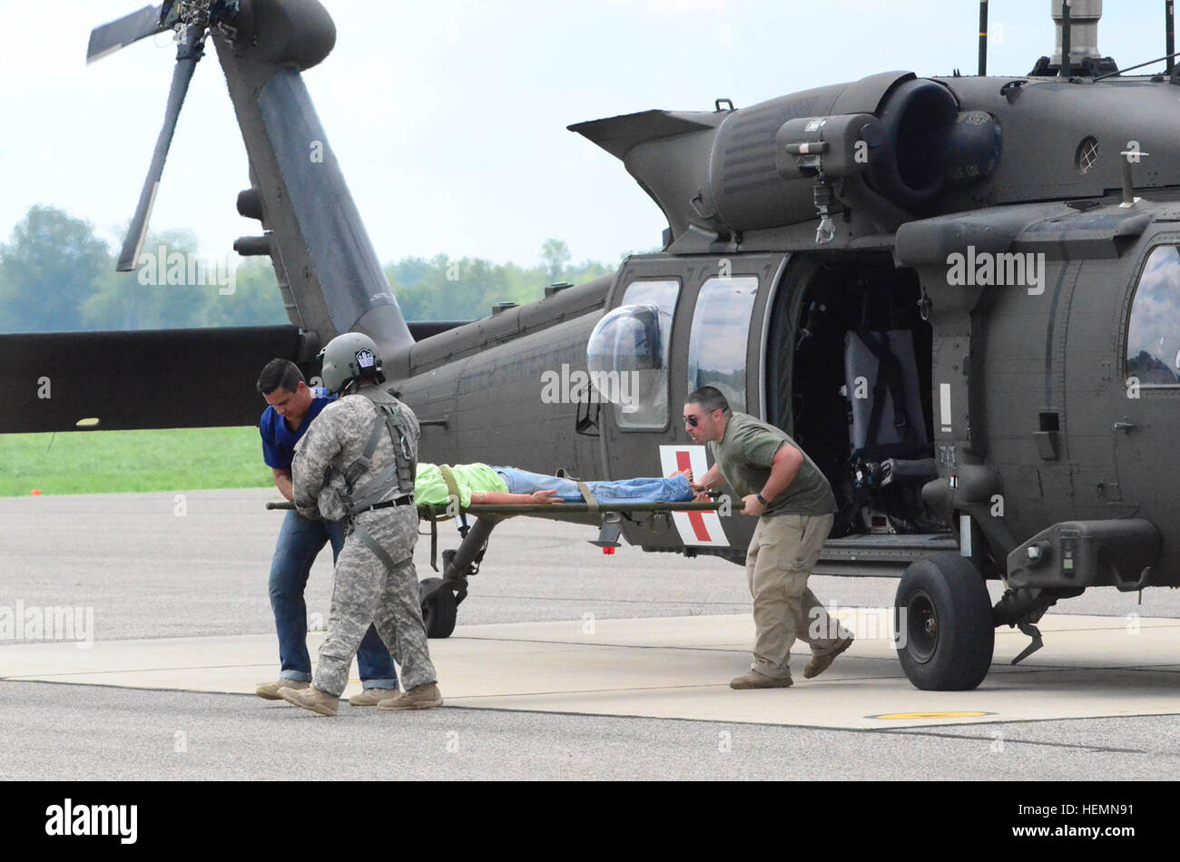 U.S. Army Sgt. Brandon Bates, left, a military police officer, with ...