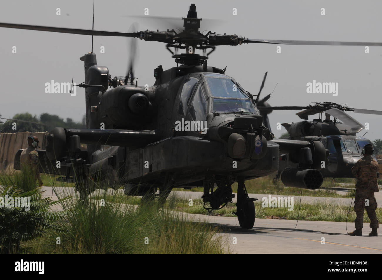 Two AH-64 Apache helicopter maintainers assigned to 1-10 Attack ...