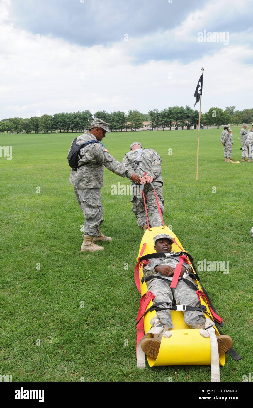 Soldiers from Operation Sustainment Warrior's Delta Company drag a ...