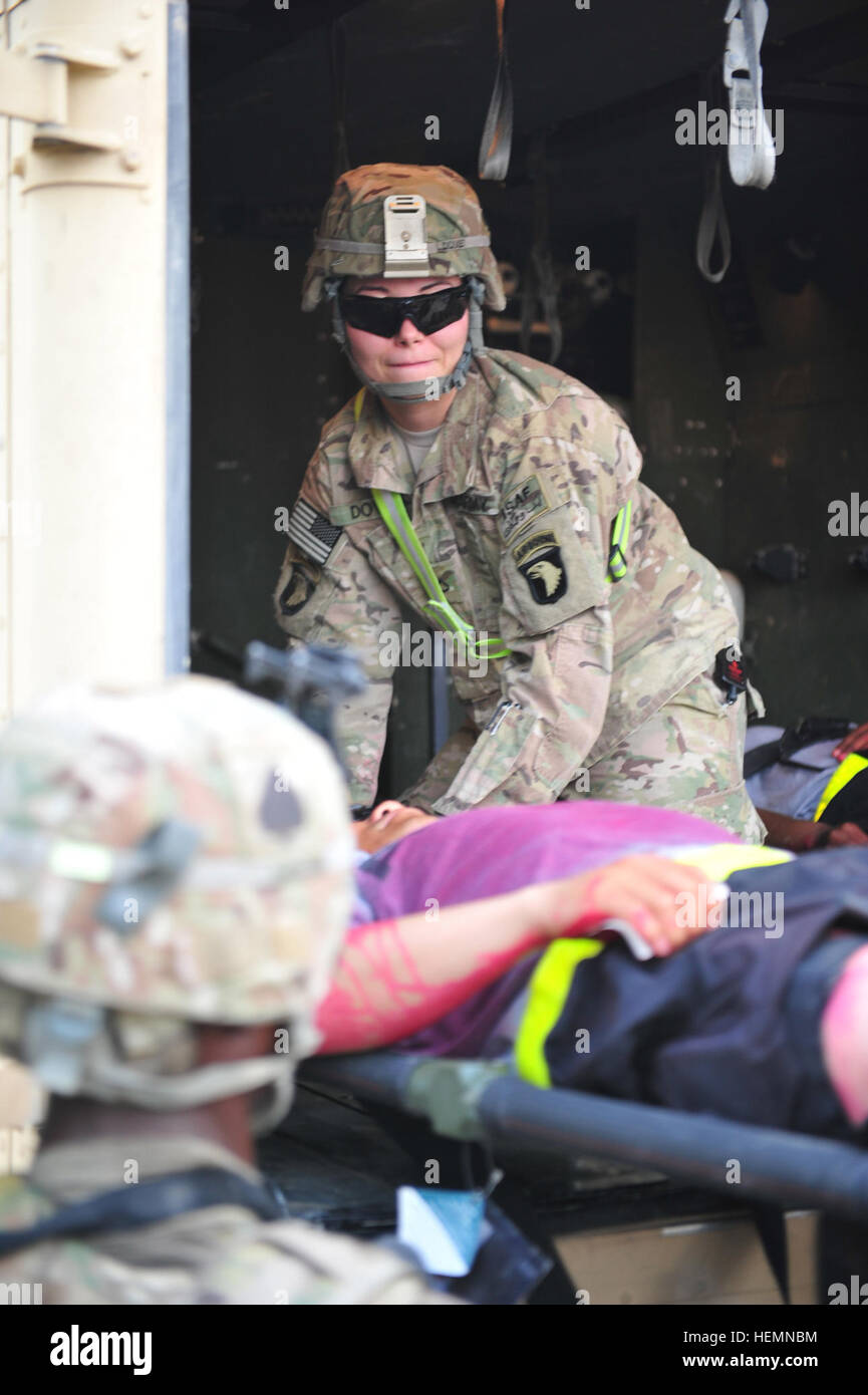 U.S. Army Pfc. Katie Dove, a combat medic with Charlie Company, 801st ...
