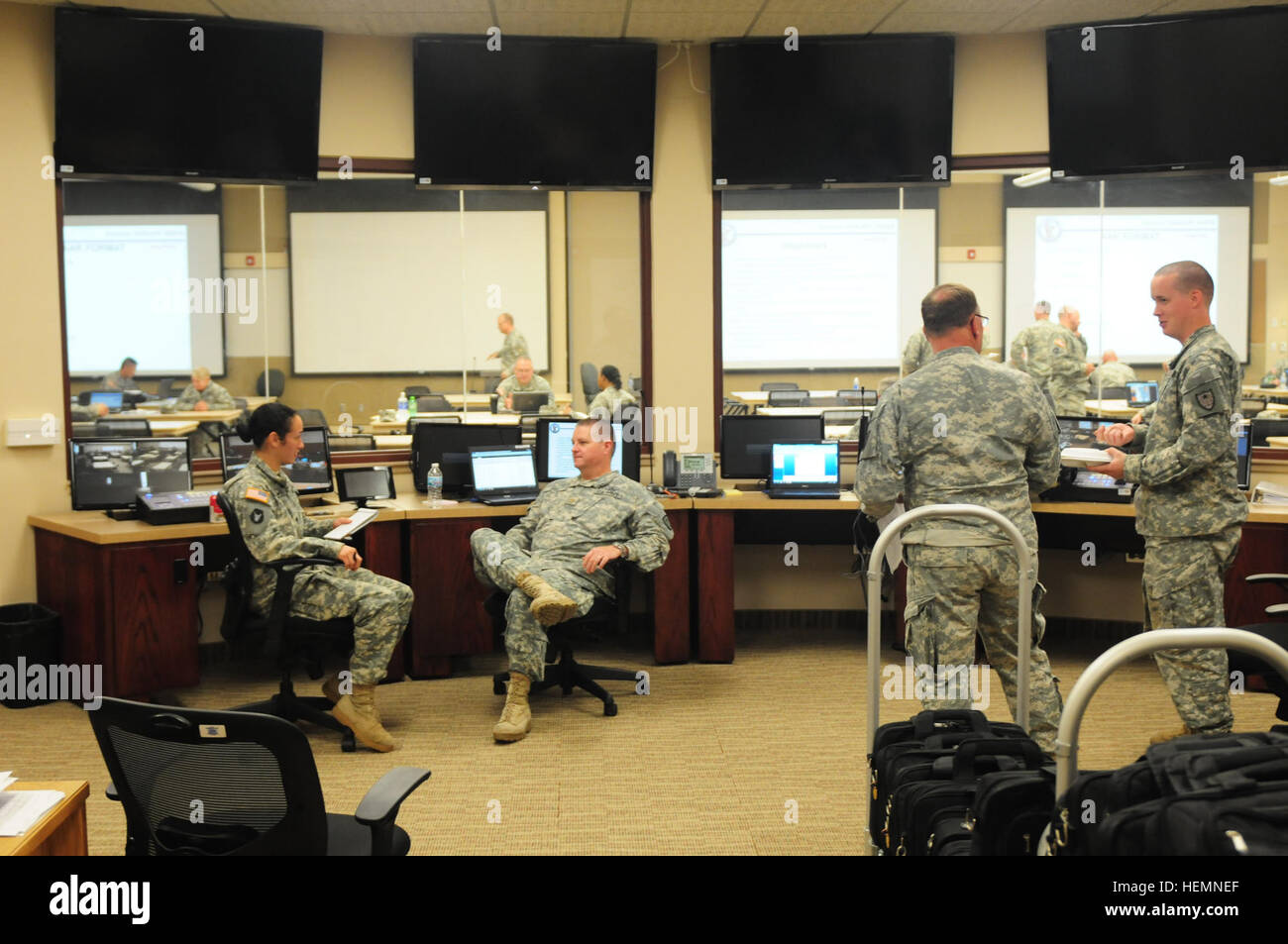 Lead exercise controller Maj. Taylor Cox explains the details of how ...