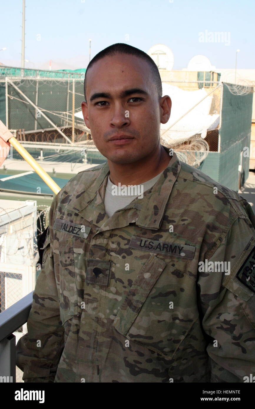 Spc. Victor P. Valdez, 33, is a multi-channel transmissions operator ...