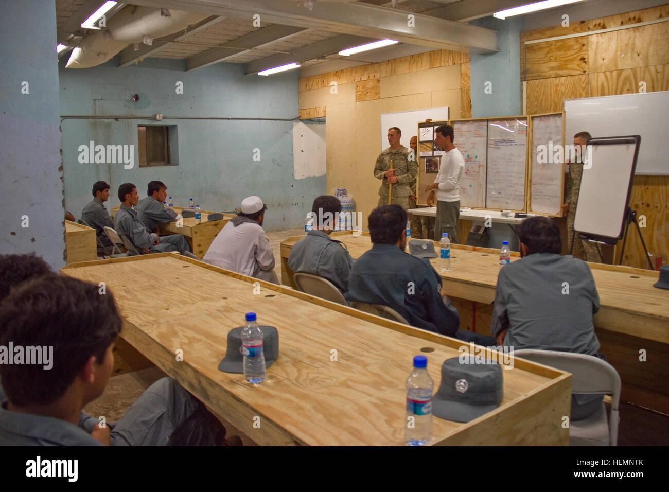 With the assistance of an interpreter, U.S. Army Staff Sgt. Bryan A ...