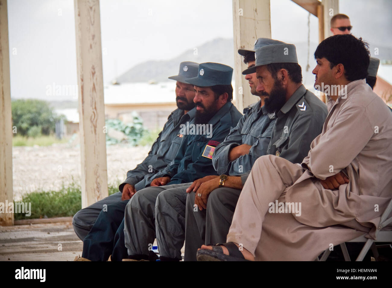 Afghan Uniformed Policemen listen to the tactical call-out portion ...