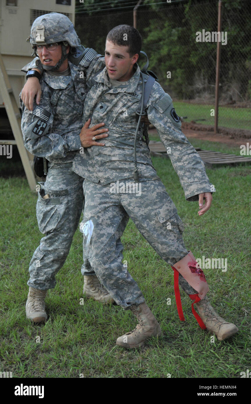 U.S. Army Sgt. Kaleigh Fetty, left, a combat medic with the 602nd Area ...