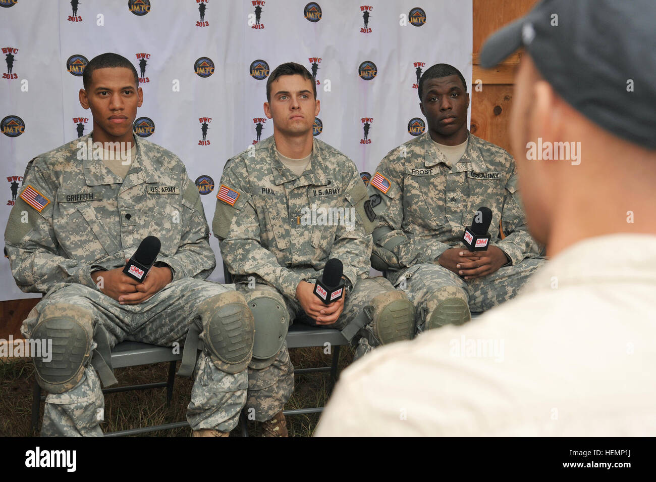 U.S. Army 2nd Lt. Michael Pikul (center), assigned to 30th Medical ...